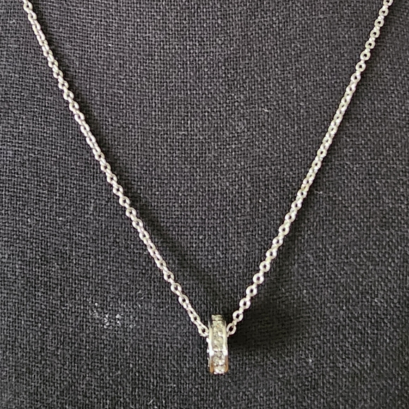 Nina Ricci | Jewelry | Nina Ricci Crystal And Silver Logo Pendant ...